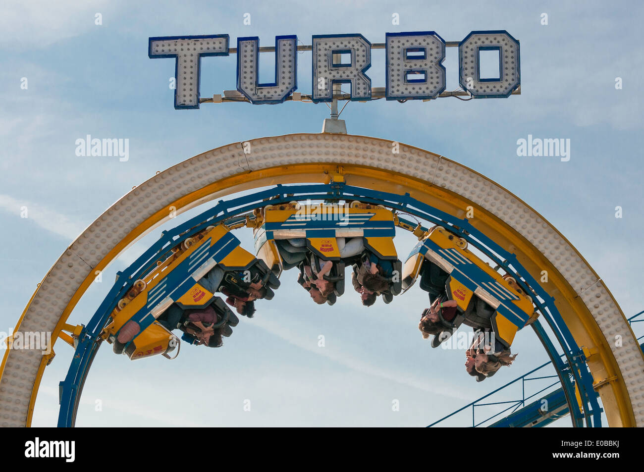 Passengers upside down on the Turbo coaster ride . Brighton pier ...