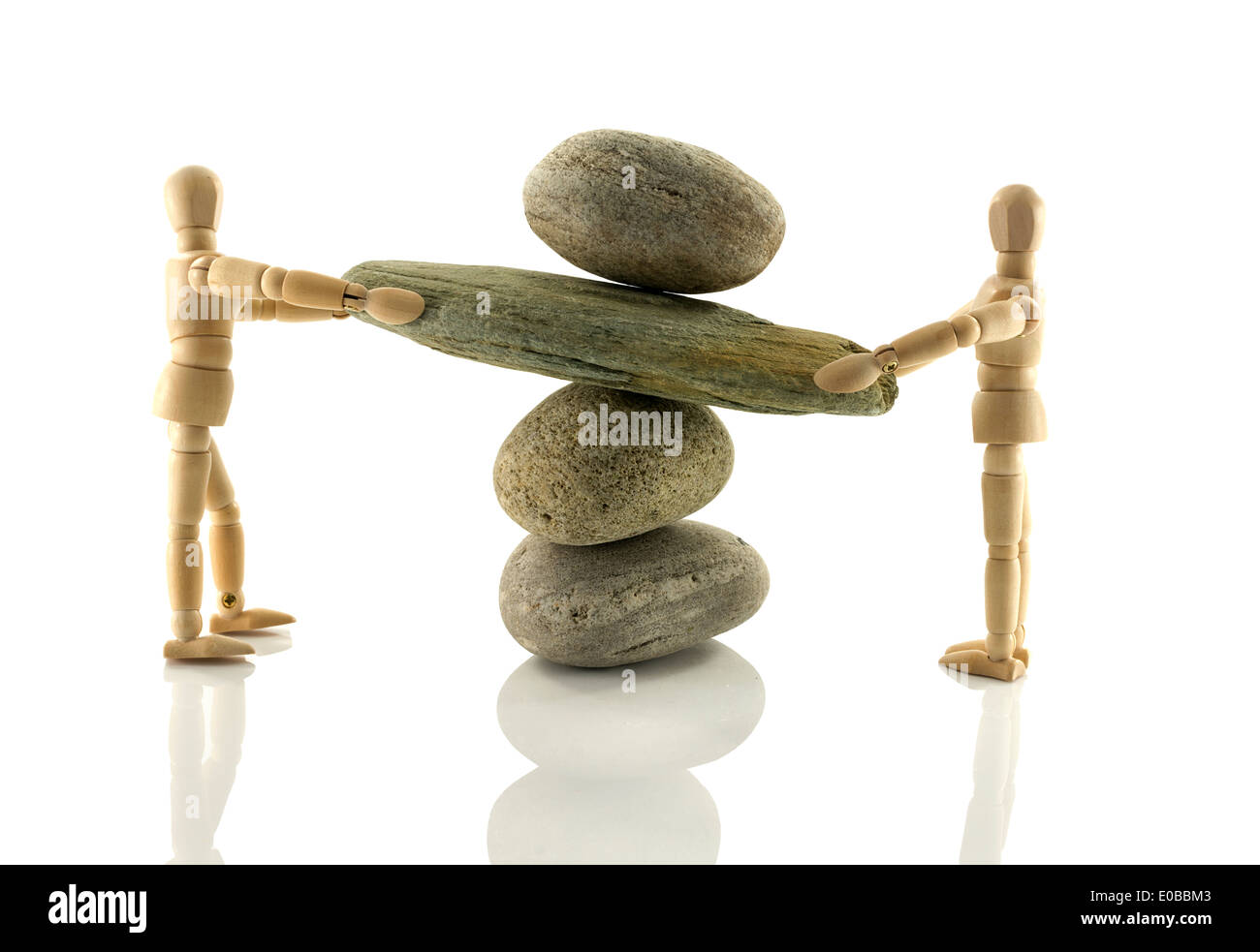 teamwork wooden puppets clear the case with power Stock Photo - Alamy