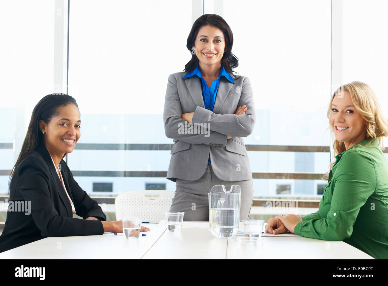 Group Of Women Meeting In Office Stock Photo - Alamy