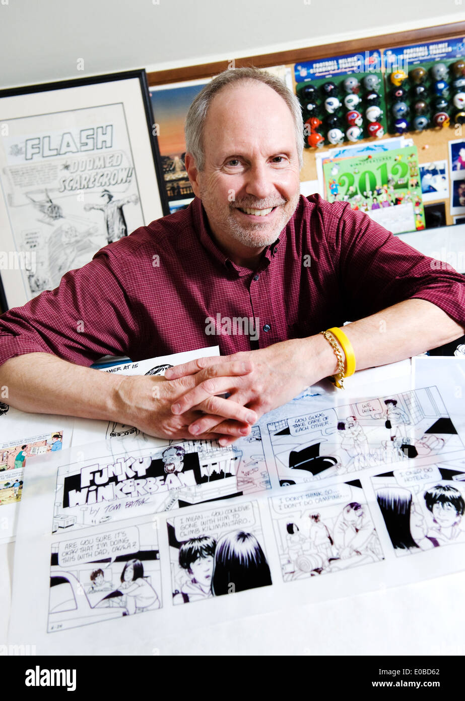 Artist Tom Batiuk with some of his work Funky Winkerbean Stock Photo ...