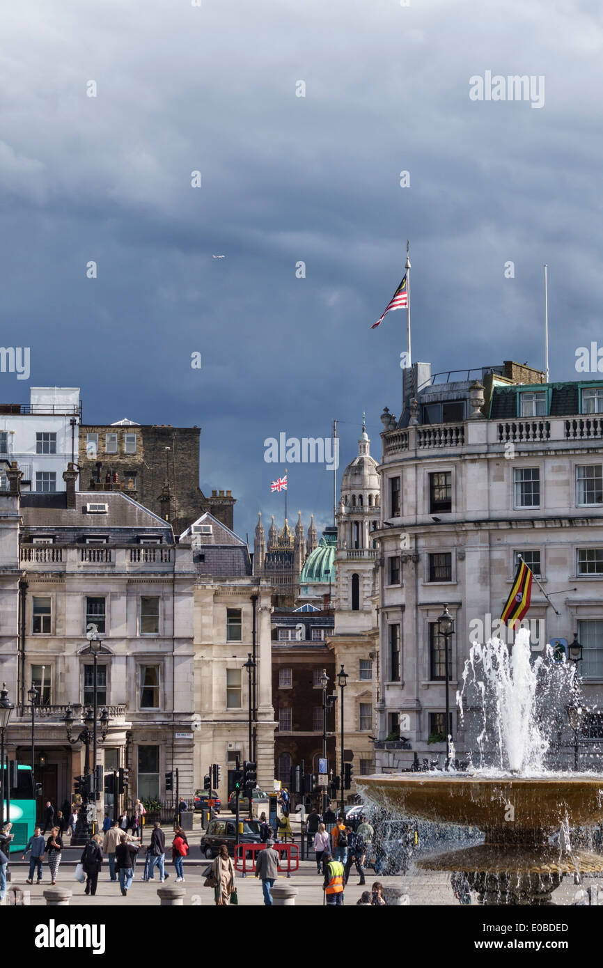 Trafalgar Square, London, UK, with the Victoria Tower in the distance ...