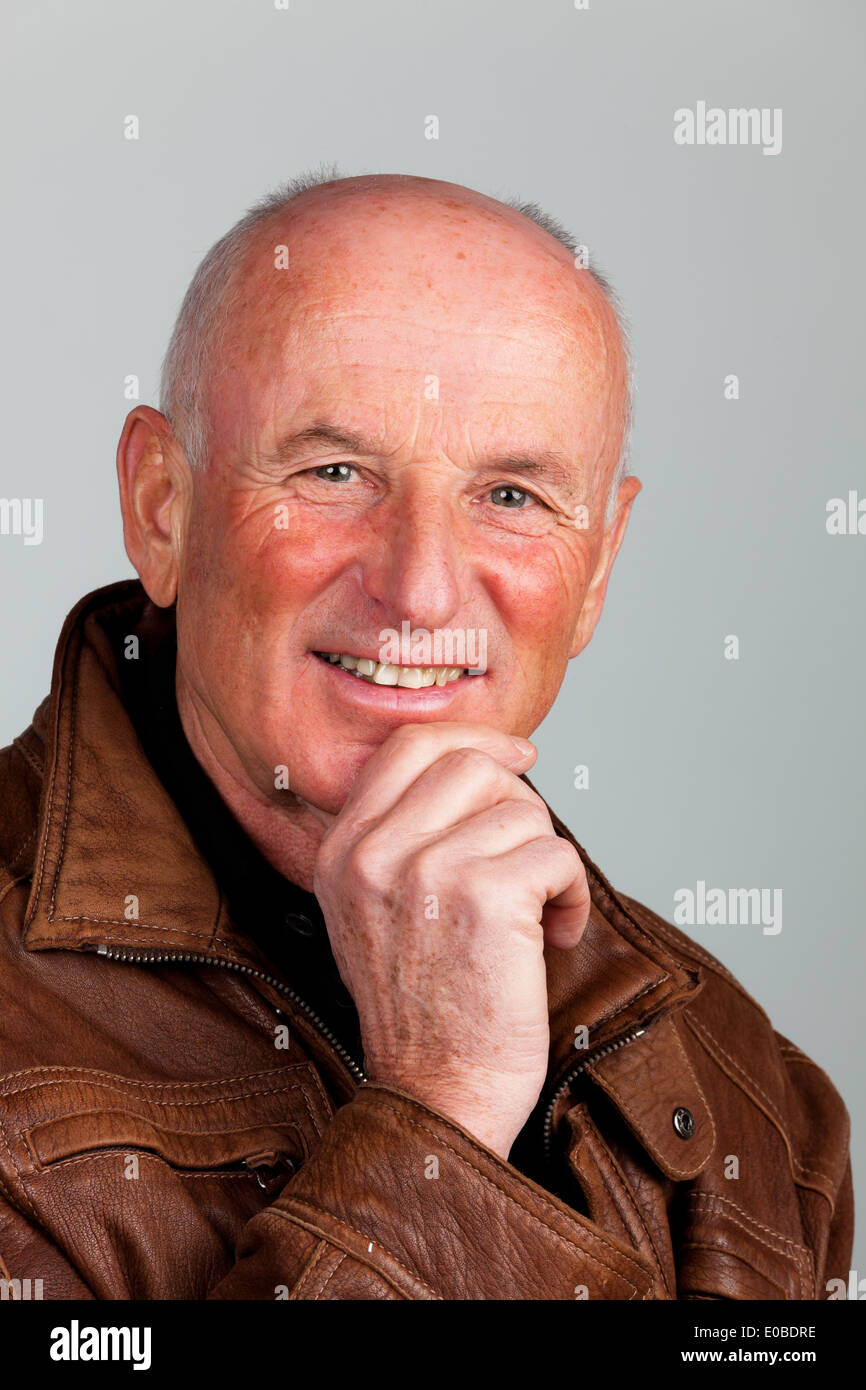 Senior citizens portrait. Portrait of a friendly older man Stock Photo ...