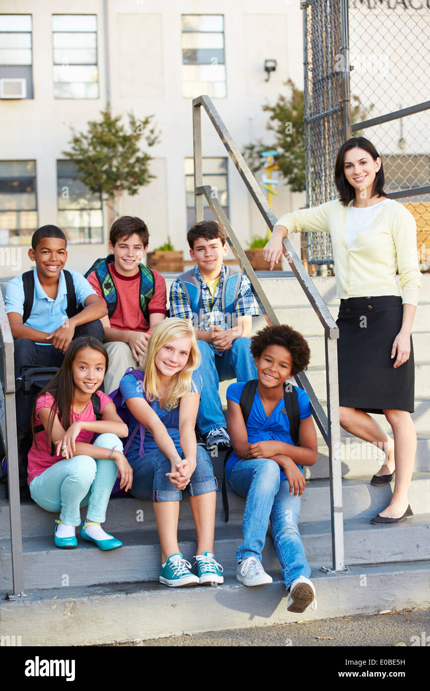 Group of Elementary Pupils Outside Classroom With Teacher Stock Photo ...