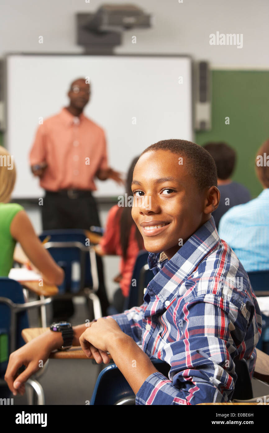 Male Teenage Pupil In Classroom Stock Photo - Alamy