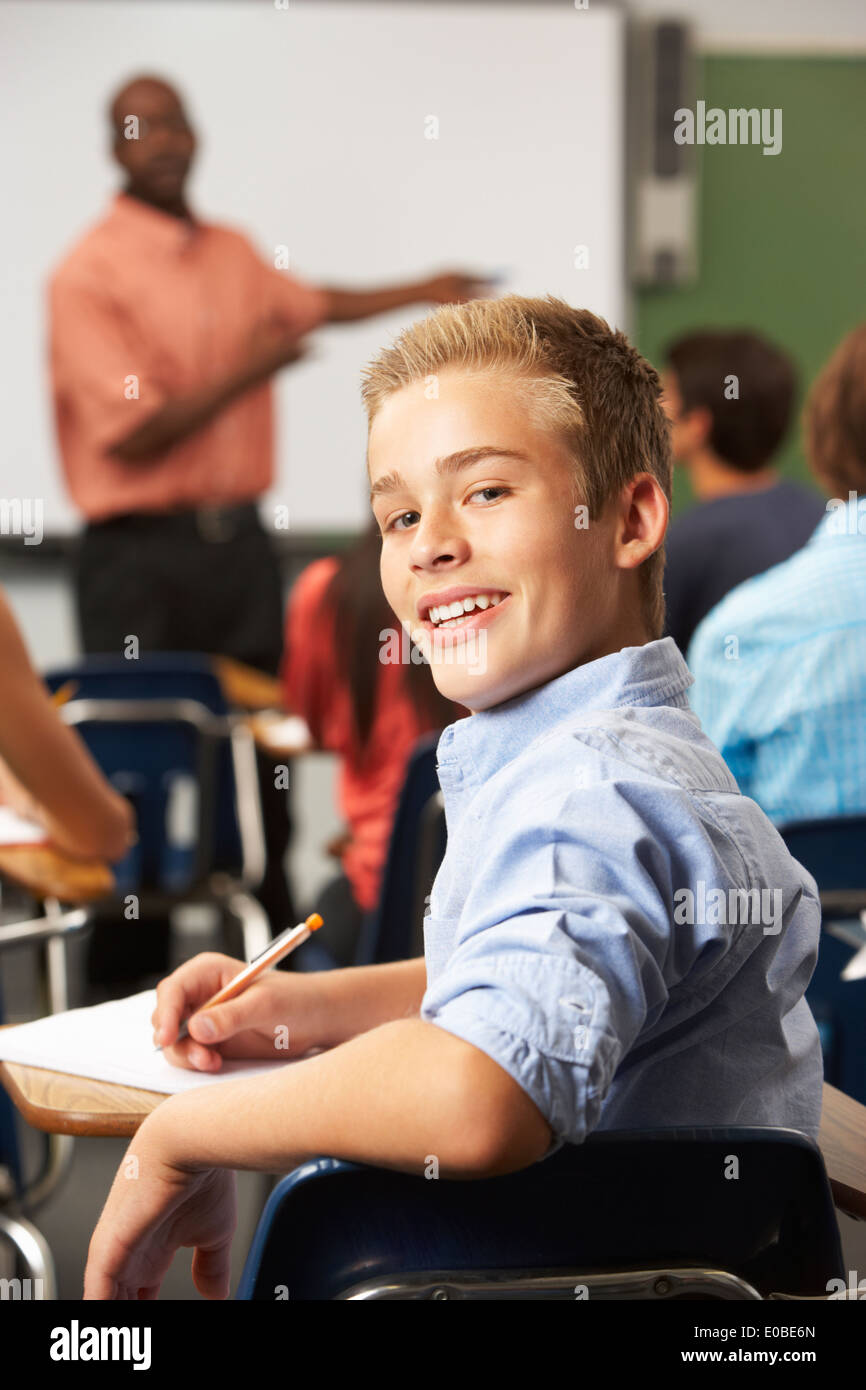 Male Teenage Pupil In Classroom Stock Photo - Alamy