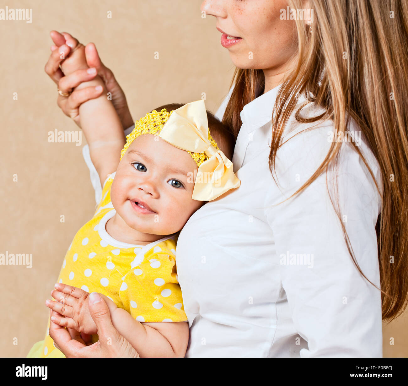 Happy young mum with the baby Stock Photo - Alamy