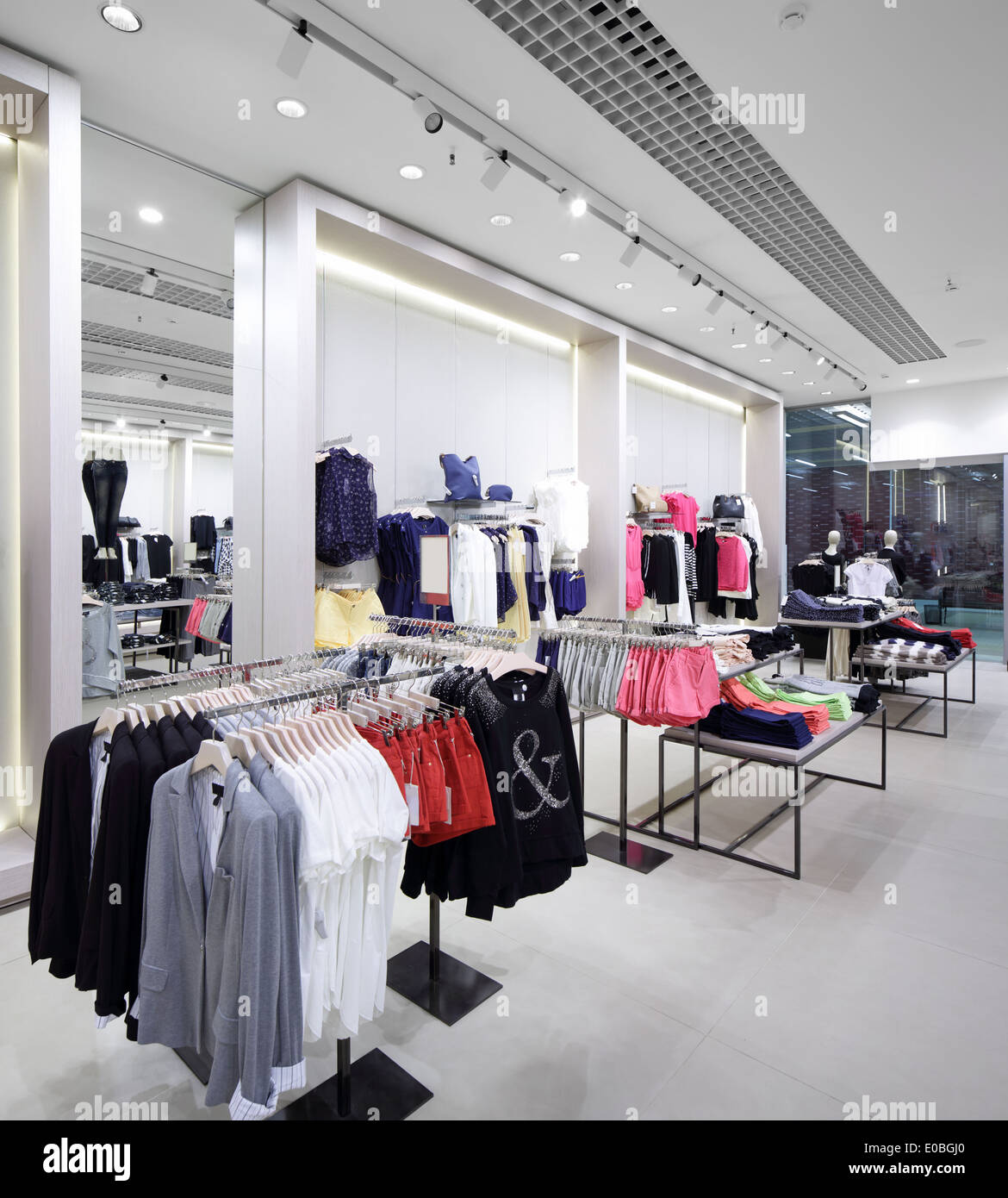 luxury and fashionable brand new interior of cloth store Stock Photo ...
