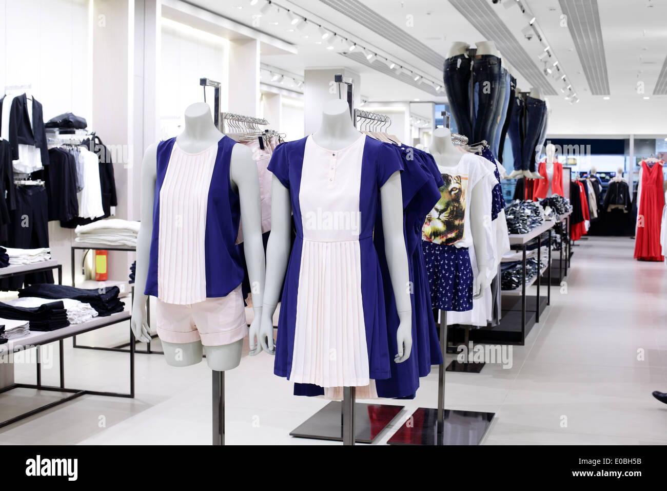 luxury and fashionable brand new interior of cloth store Stock Photo ...