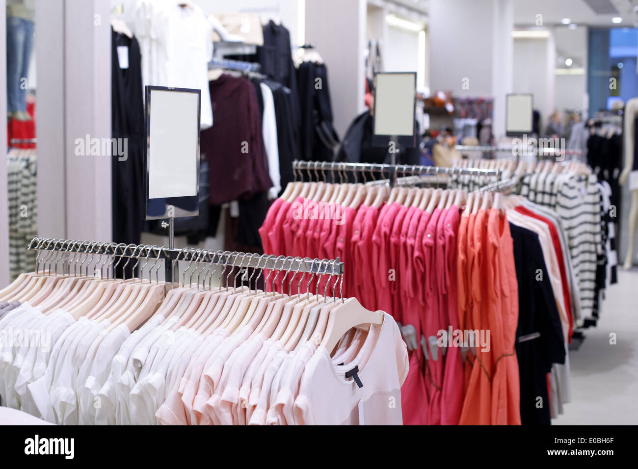 luxury and fashionable brand new interior of cloth store Stock Photo ...