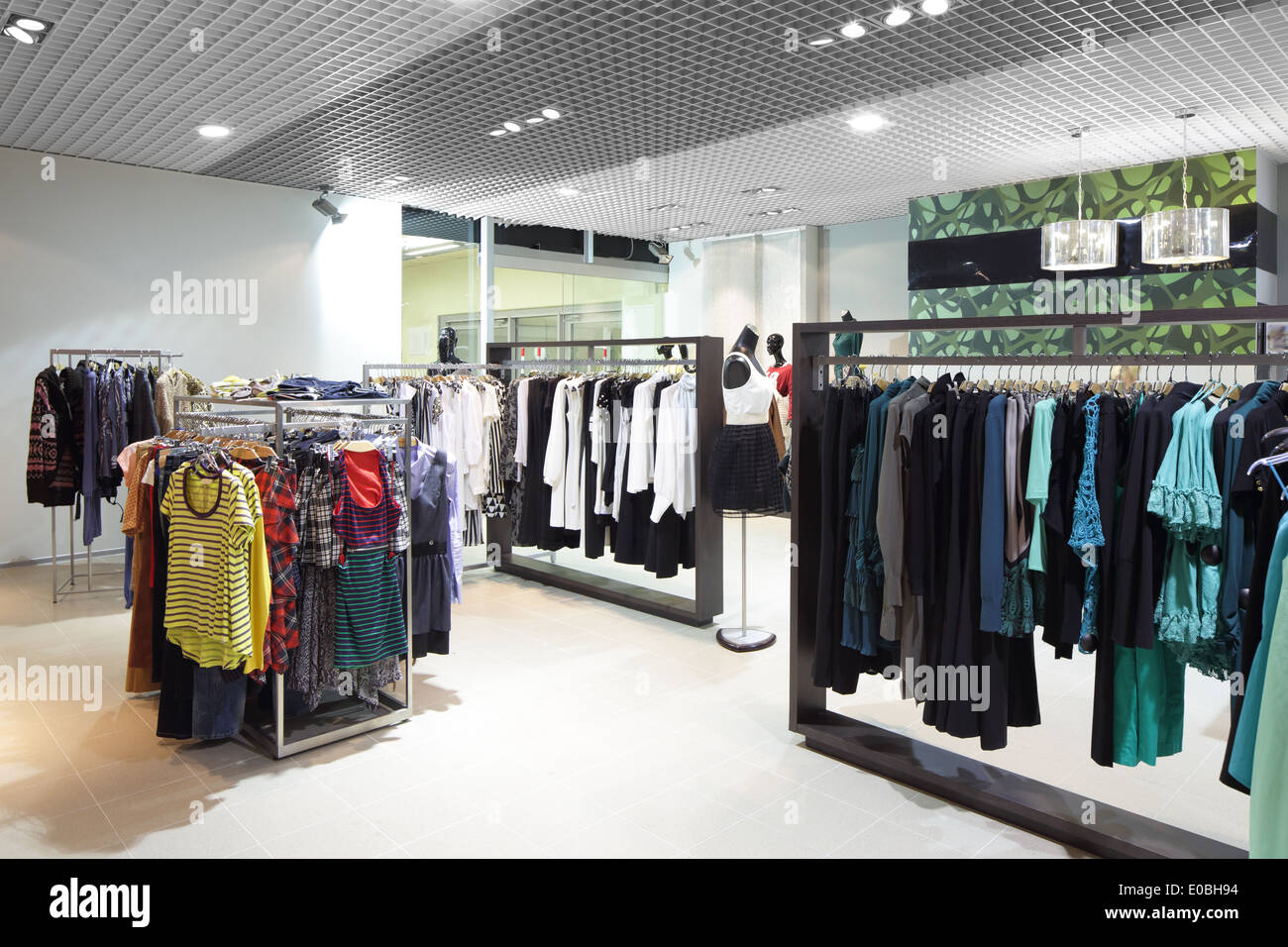 luxury and fashionable brand new interior of cloth store Stock Photo ...
