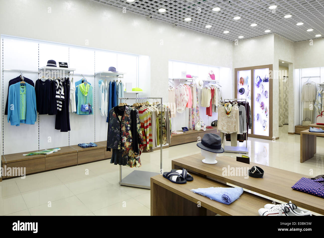 luxury and fashionable brand new interior of cloth store Stock Photo ...