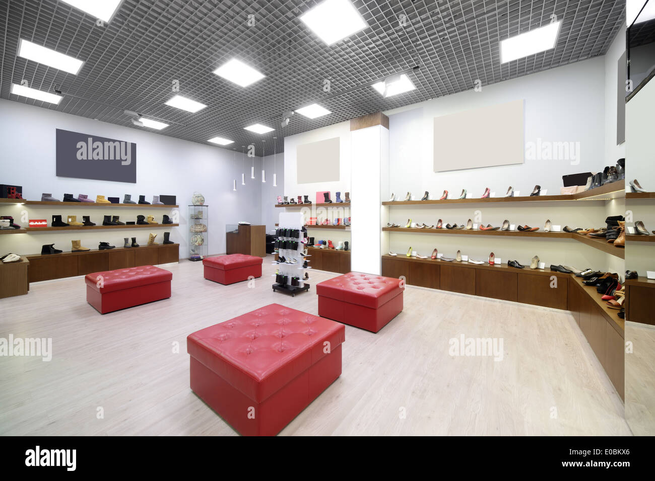 bright and fashionable interior of shoe store in modern mall Stock ...