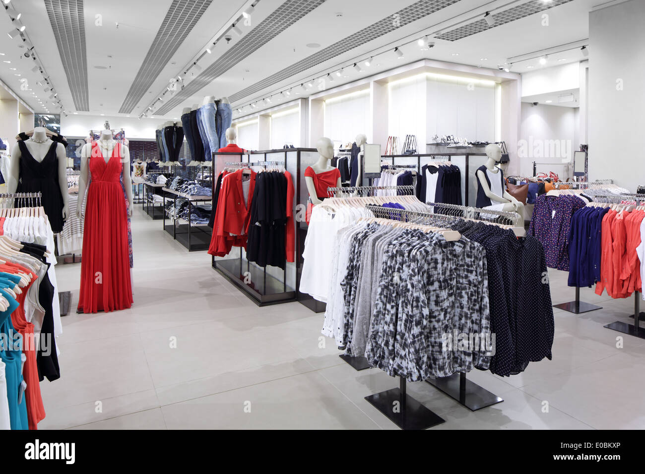 luxury and fashionable brand new interior of cloth store Stock Photo ...