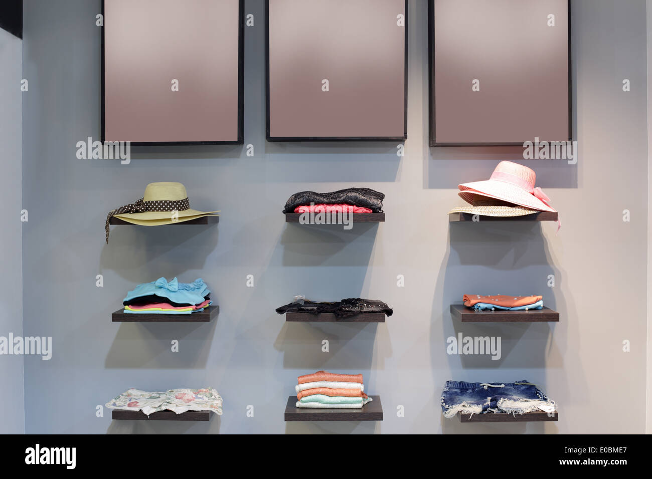 luxury and fashionable brand new interior of cloth store Stock Photo ...