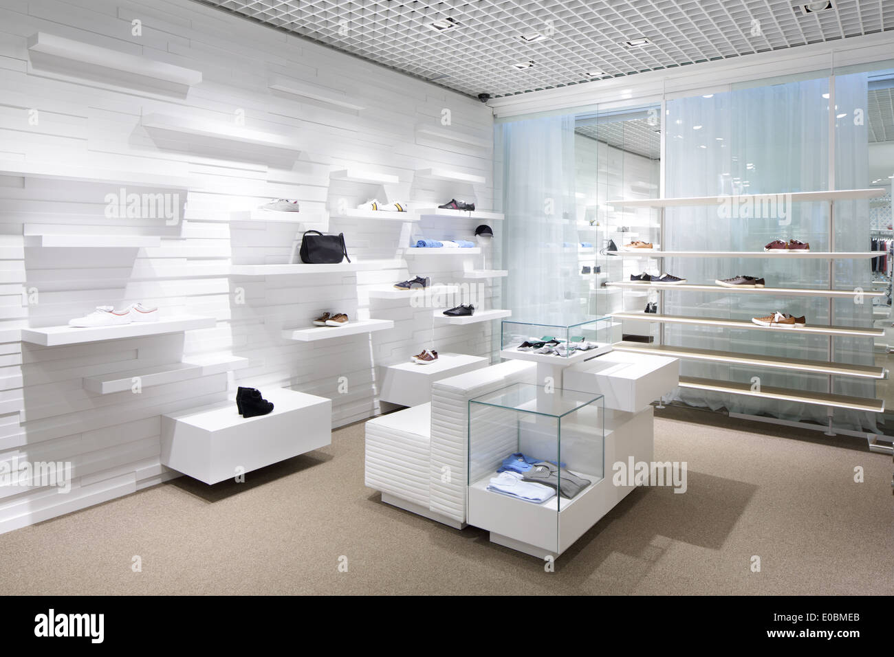 luxury and fashionable brand new interior of cloth store Stock Photo ...