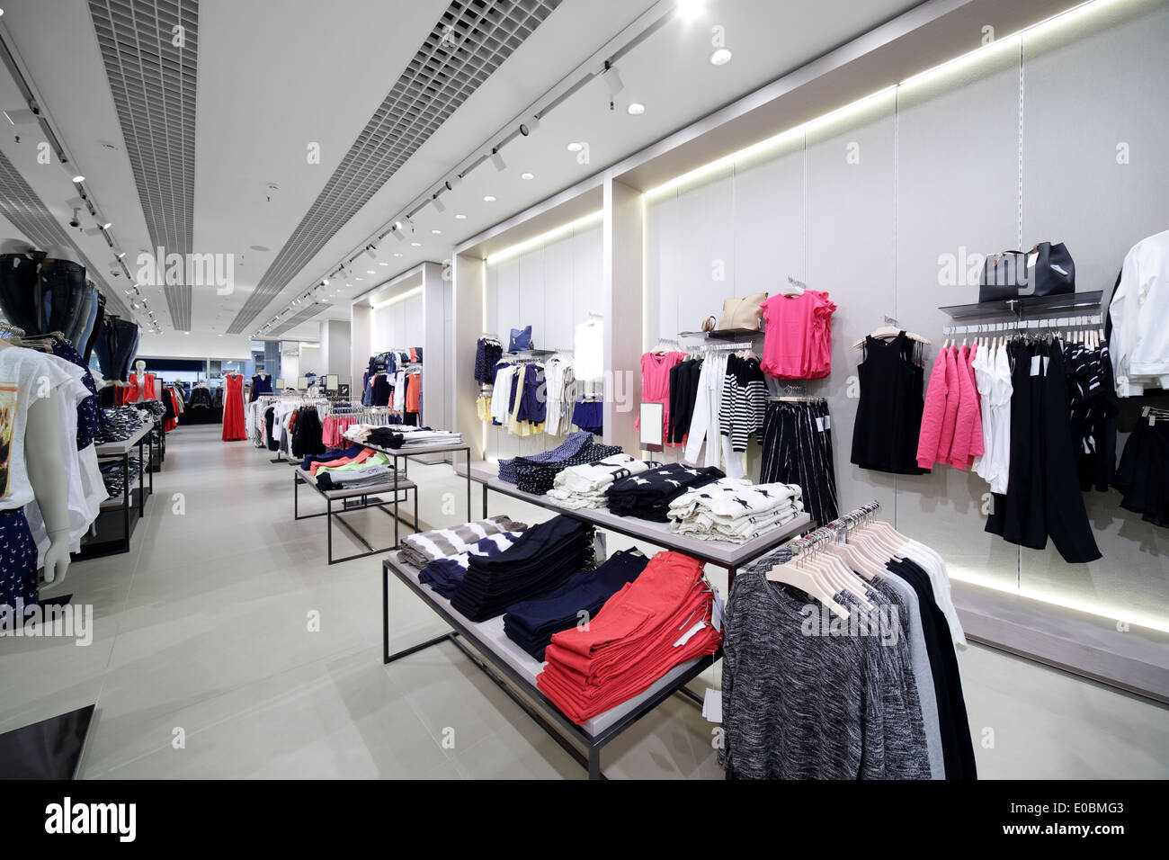 luxury and fashionable brand new interior of cloth store Stock Photo ...