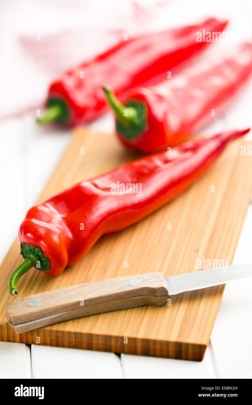 the red pepper on kitchen table Stock Photo - Alamy