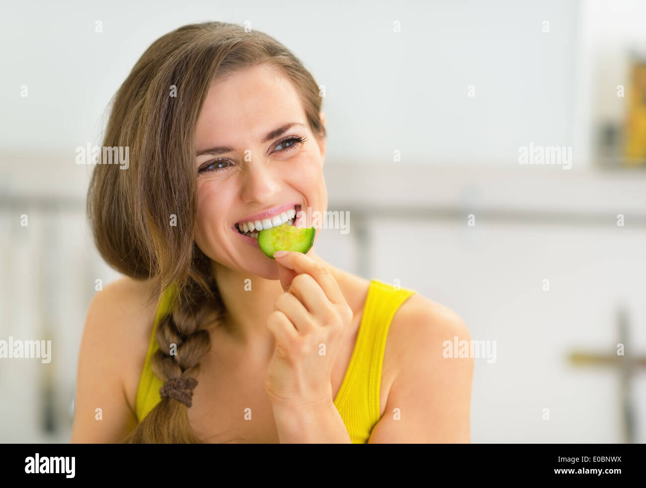 Woman eating cucumber hi-res stock photography and images - Alamy