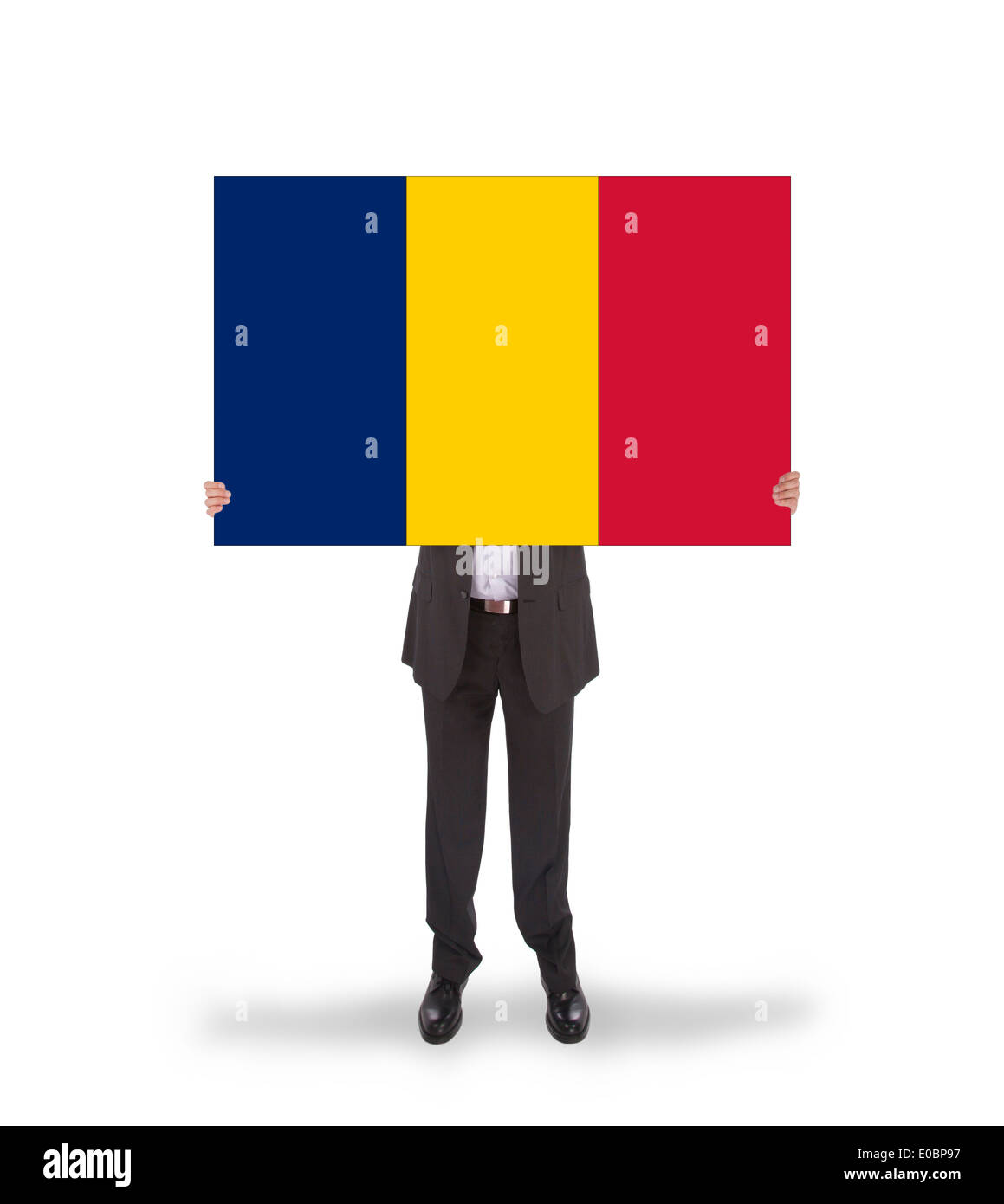 Businessman holding a big card flag of Chad Stock Photo - Alamy