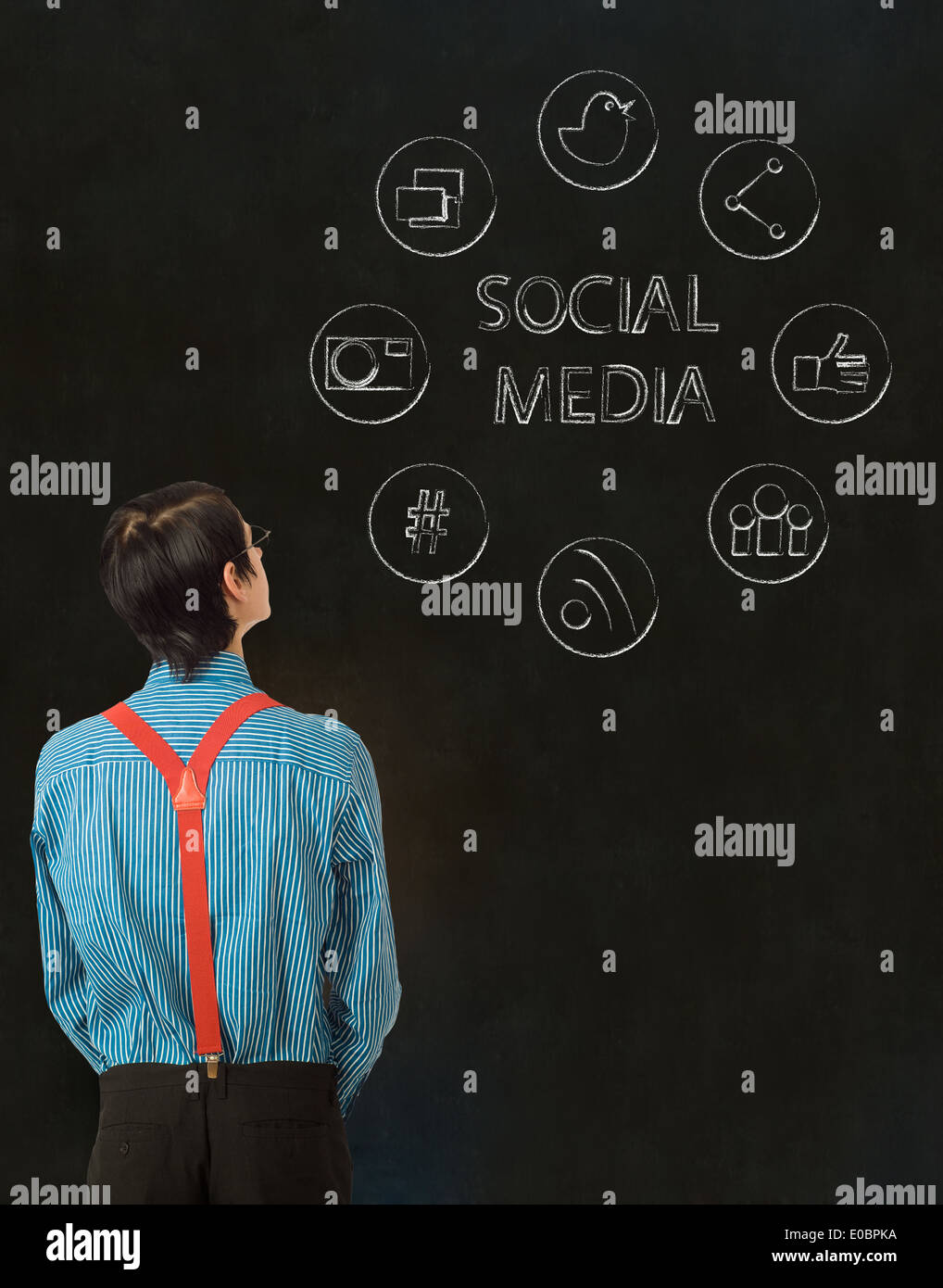 Nerd geek businessman with computer social media network icons on ...