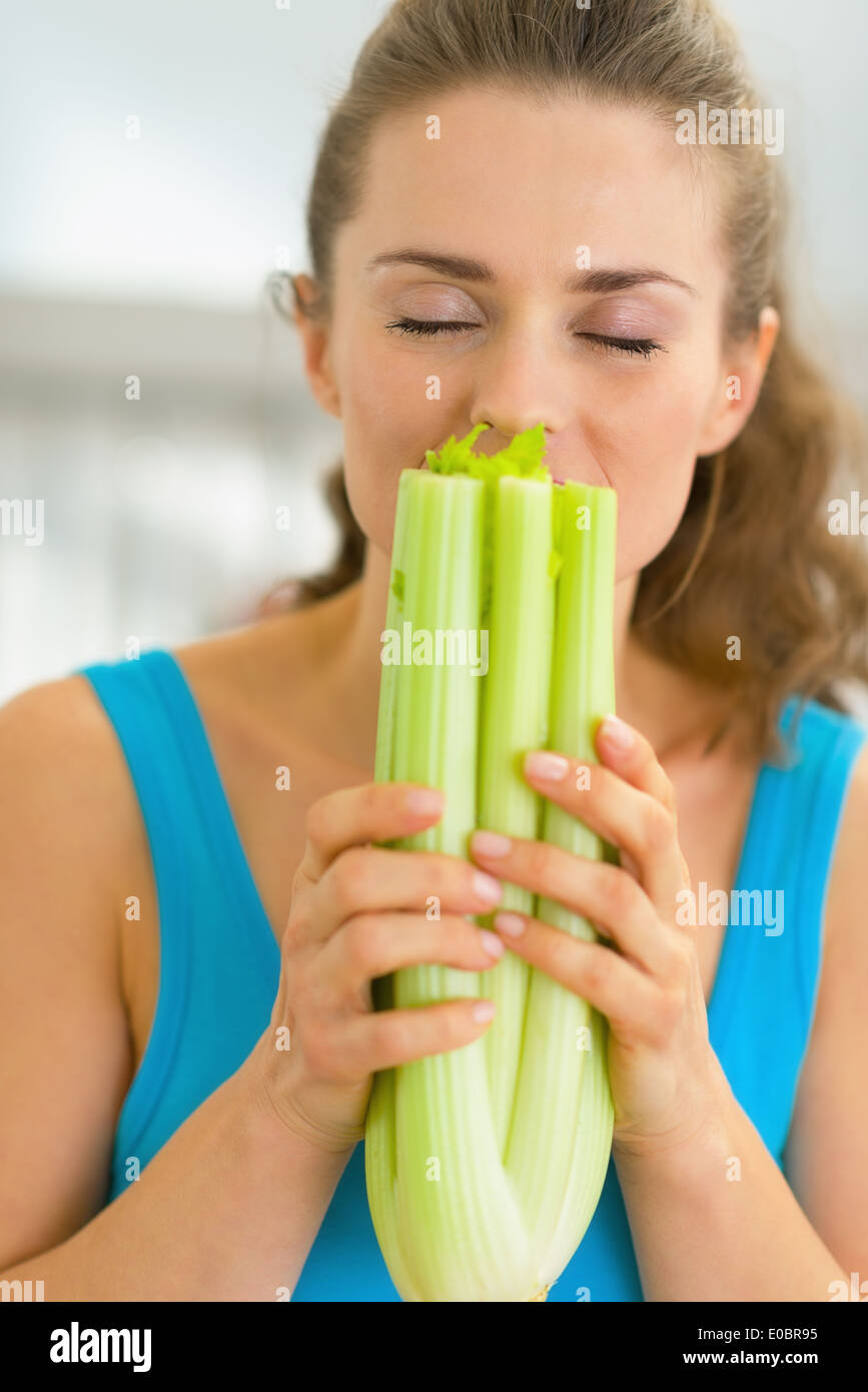 Woman smelling food cooking at home hi-res stock photography and images ...