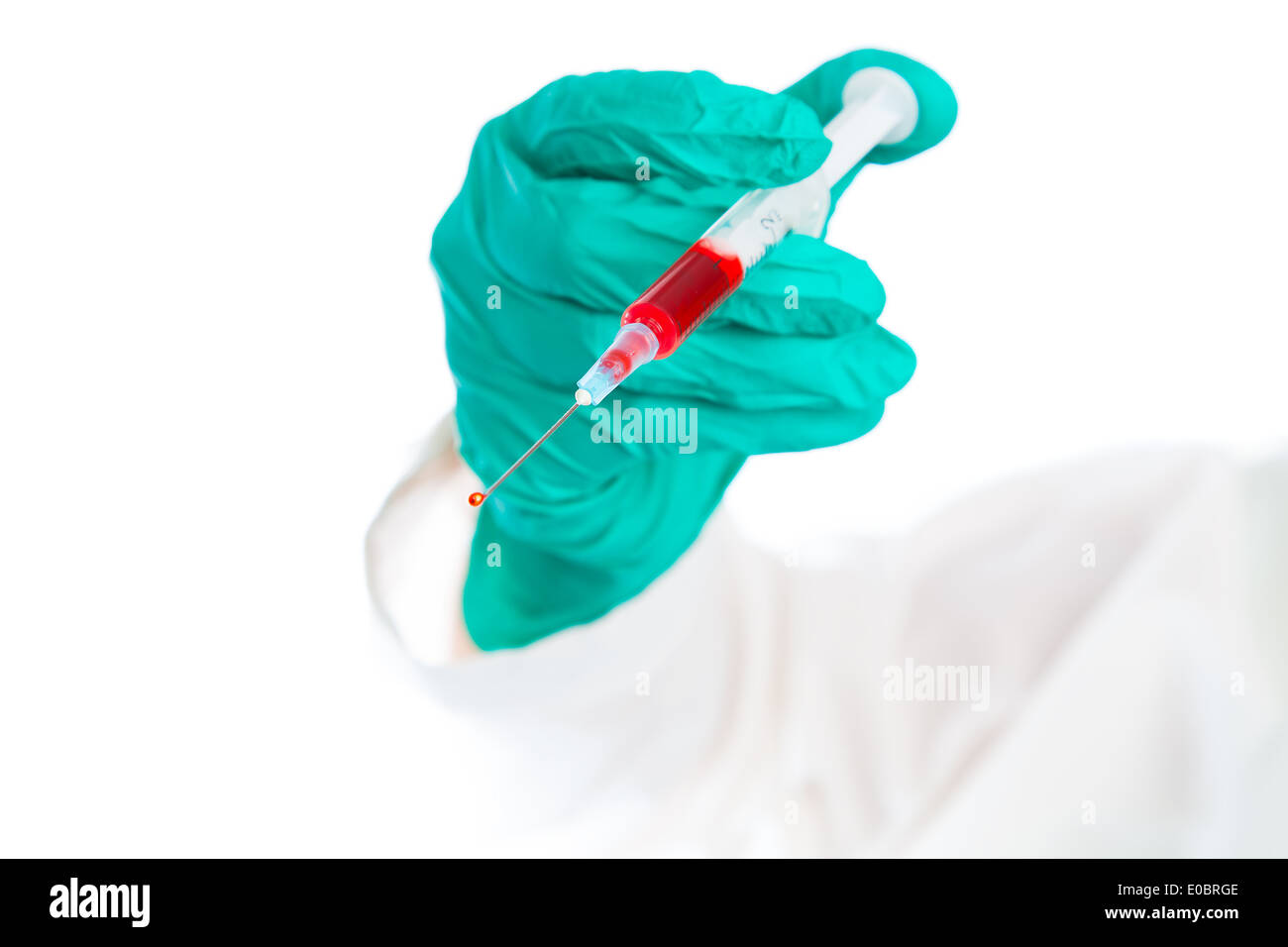 Close up hand holding syringe hi-res stock photography and images - Alamy