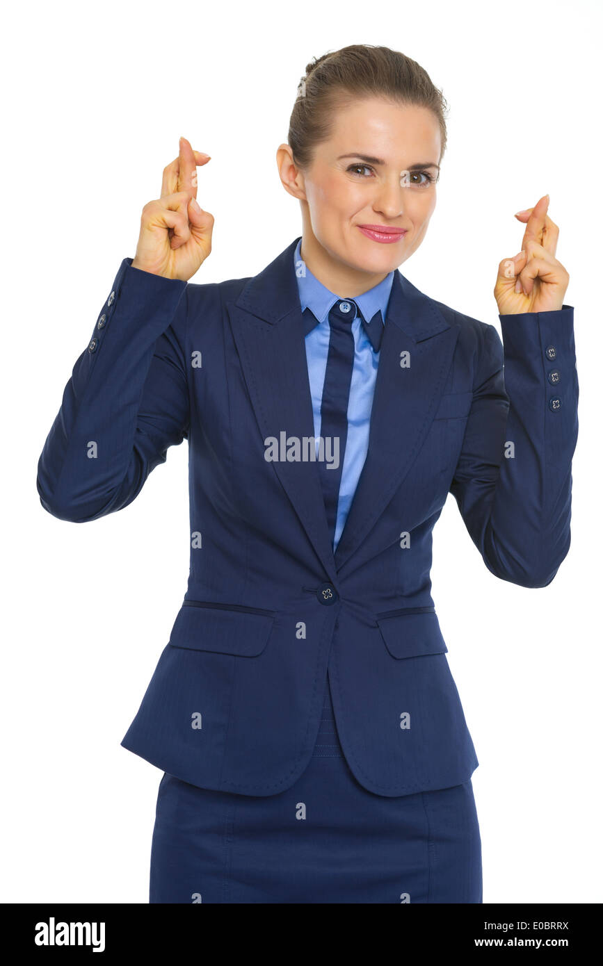 Business woman her fingers crossed hi-res stock photography and images ...
