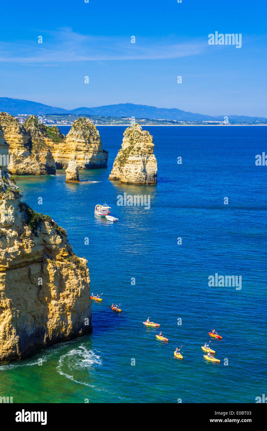 Tourist Canoes off the Cliffs at Ponta da Piedade near Lagos Algarve ...