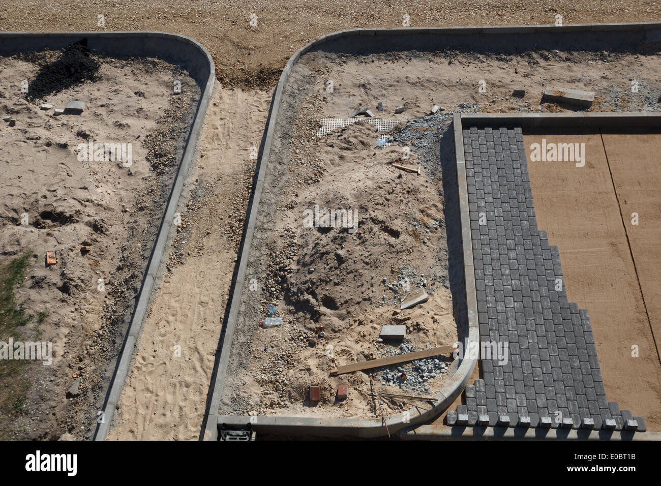 Smooth stone brick road construction Stock Photo - Alamy