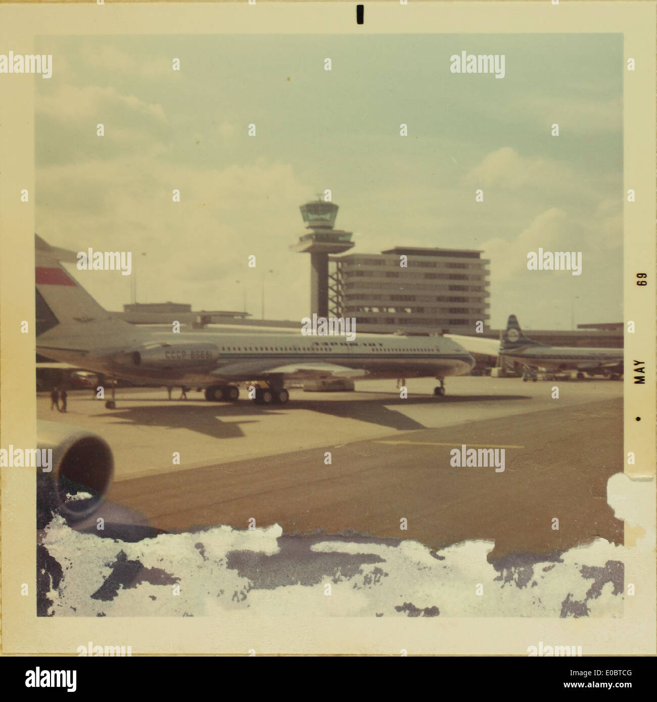 This image features an Ilyushin IL-62 aircraft with the registration ...