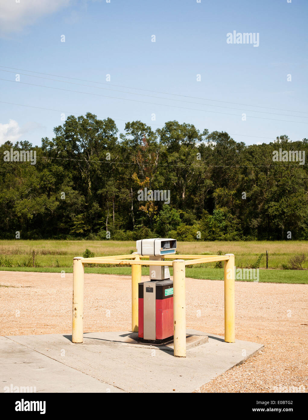 An old gas pump in an empty gas station parking lot Stock Photo - Alamy