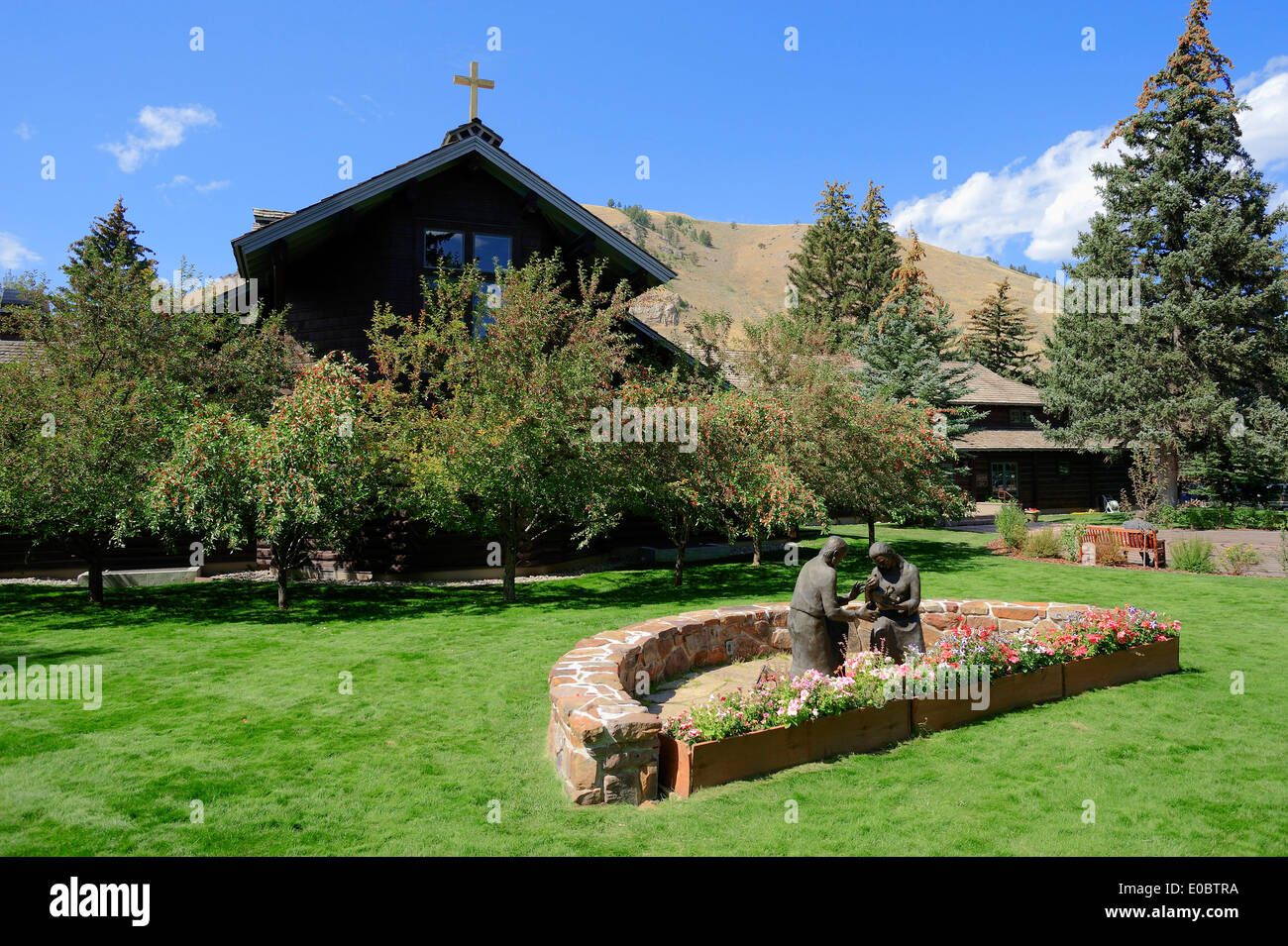 Statue and Episcopal Church, Jackson, Wyoming, USA Stock Photo - Alamy