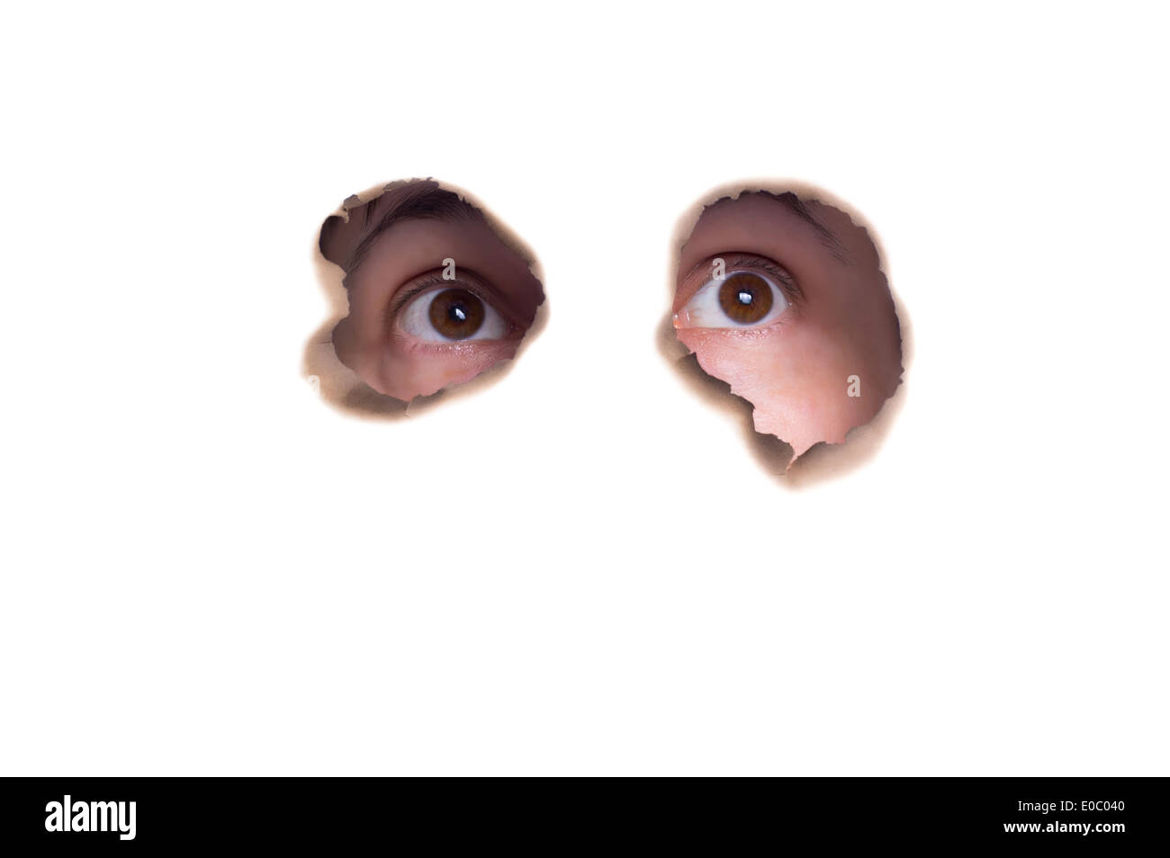 Eye looking through hole hi-res stock photography and images - Alamy