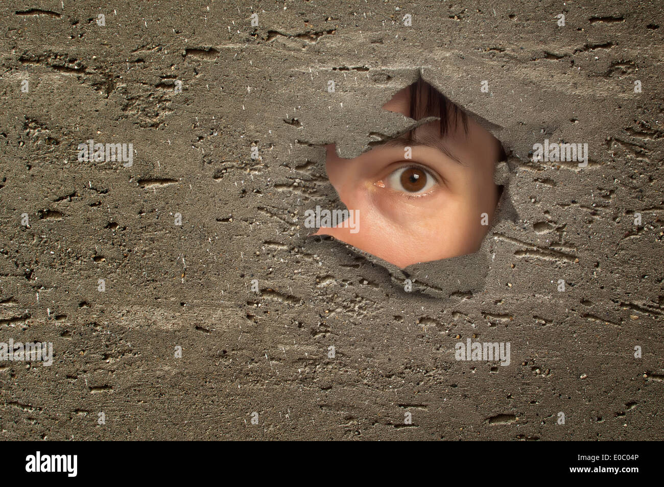 Peeking through the wall hi-res stock photography and images - Alamy