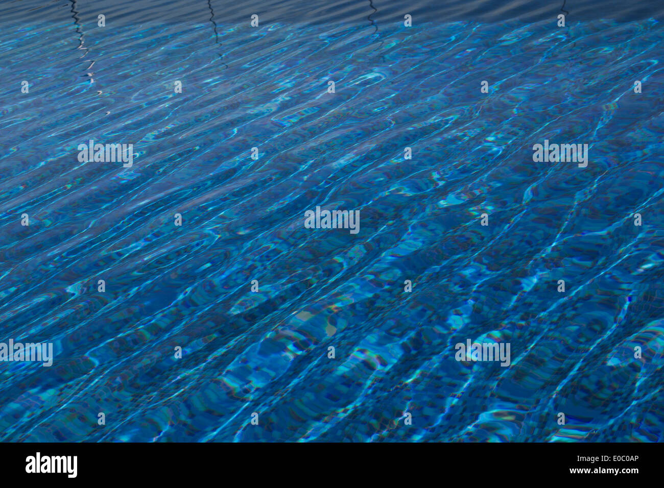Swimming pool with reflections Stock Photo - Alamy