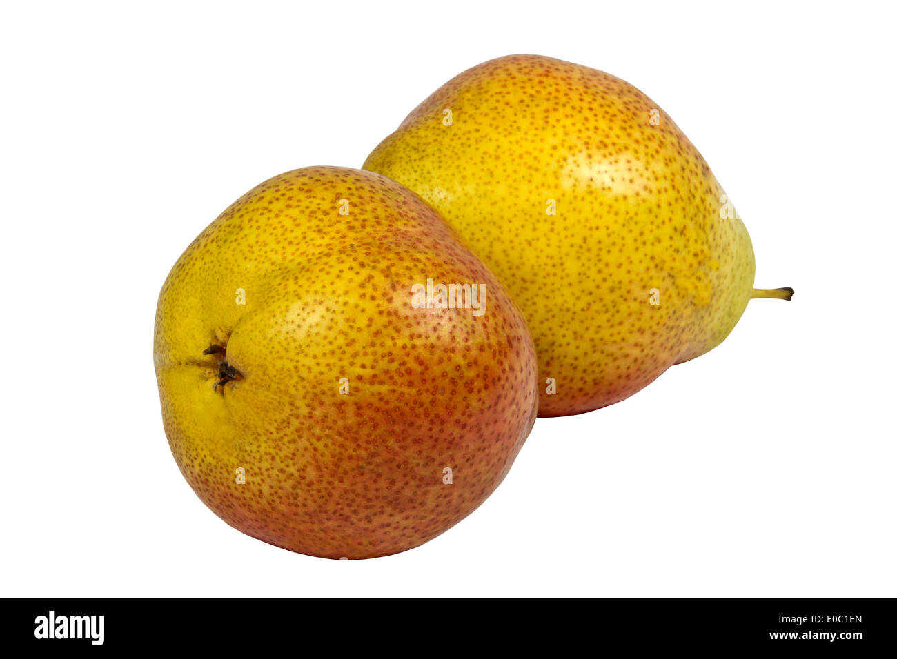 two fresh golden pears on white background Stock Photo - Alamy