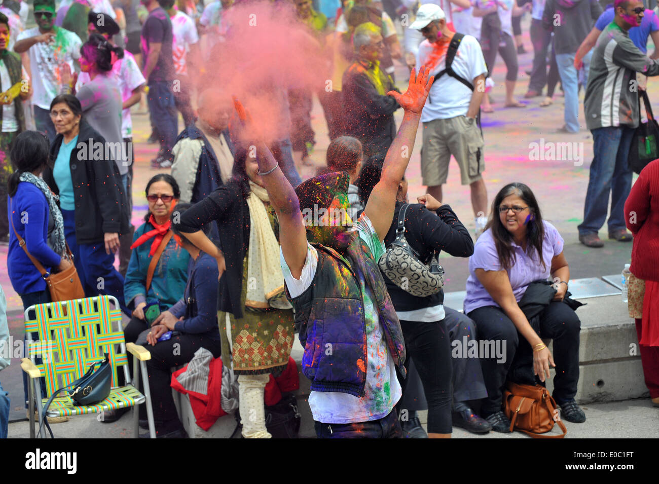 Canadians participate in the annual Spring Holi Festival by throwing ...