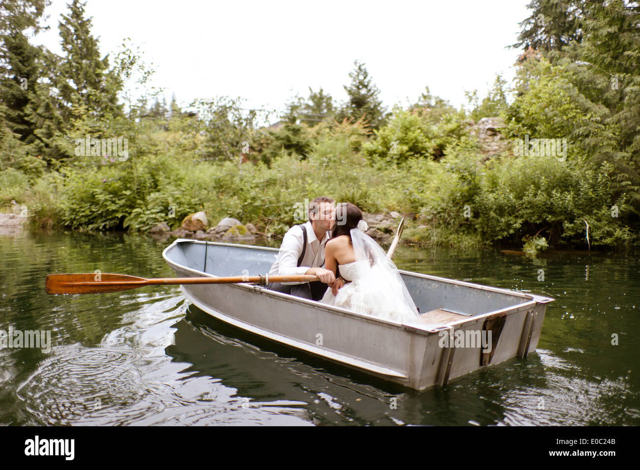 Couple row boat distance hi-res stock photography and images - Alamy
