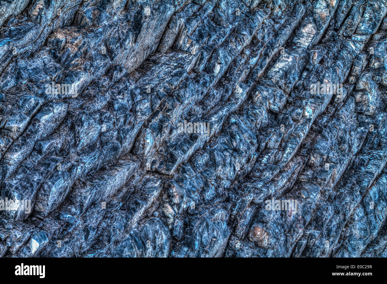 Rugged, textured, mountain rock face, full frame shot Stock Photo - Alamy