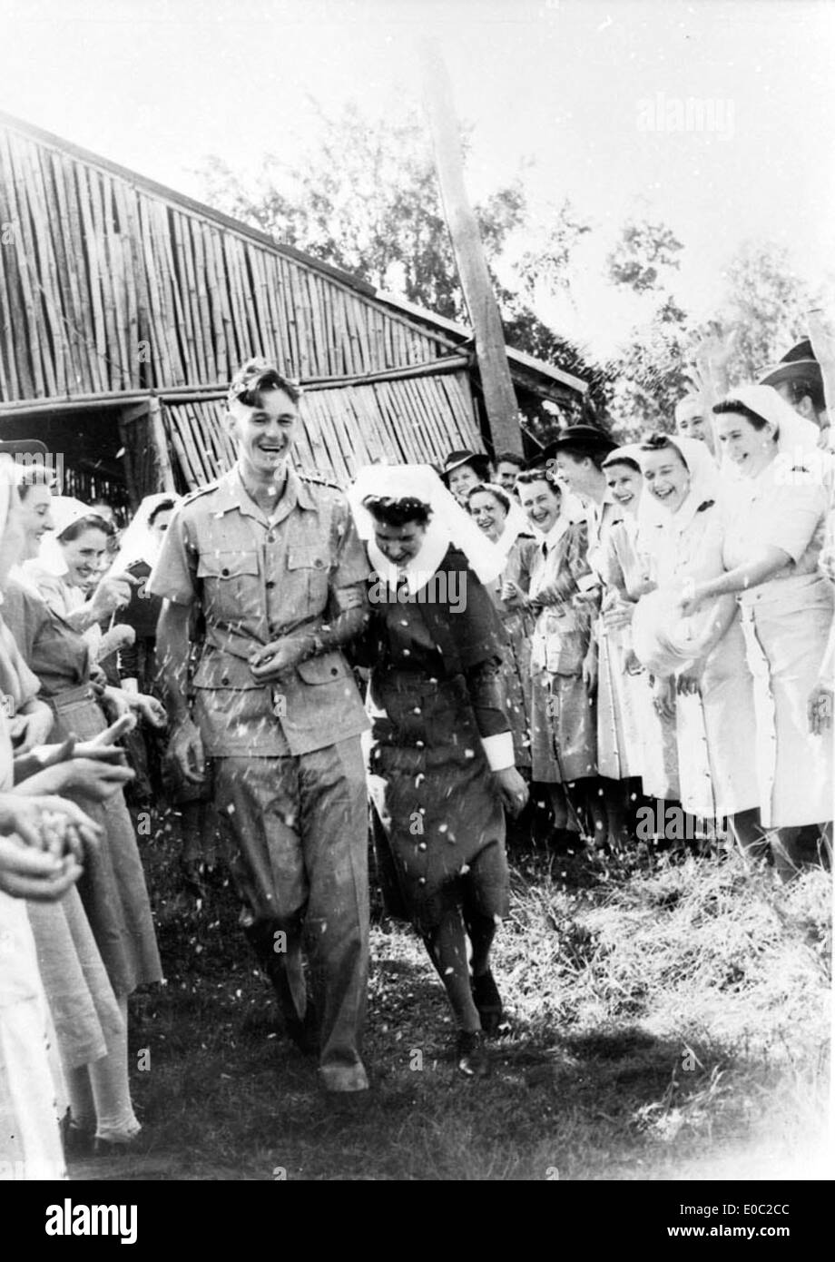 H. Woodhead and M. Timbs are pictured on their wedding day in 1943 ...