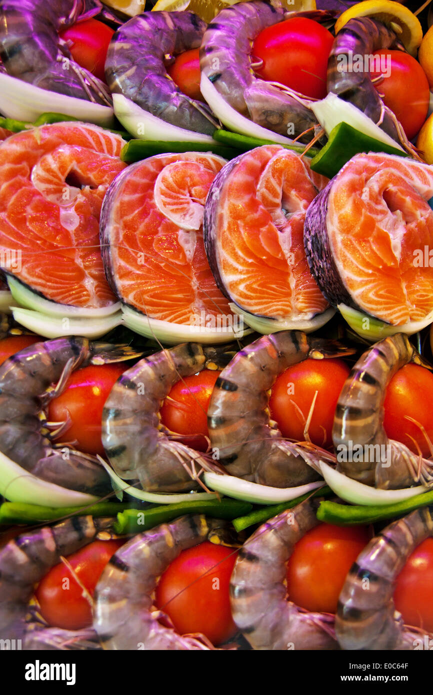 In a fish restaurant fish lie to the preparation in a glass cabinet ...