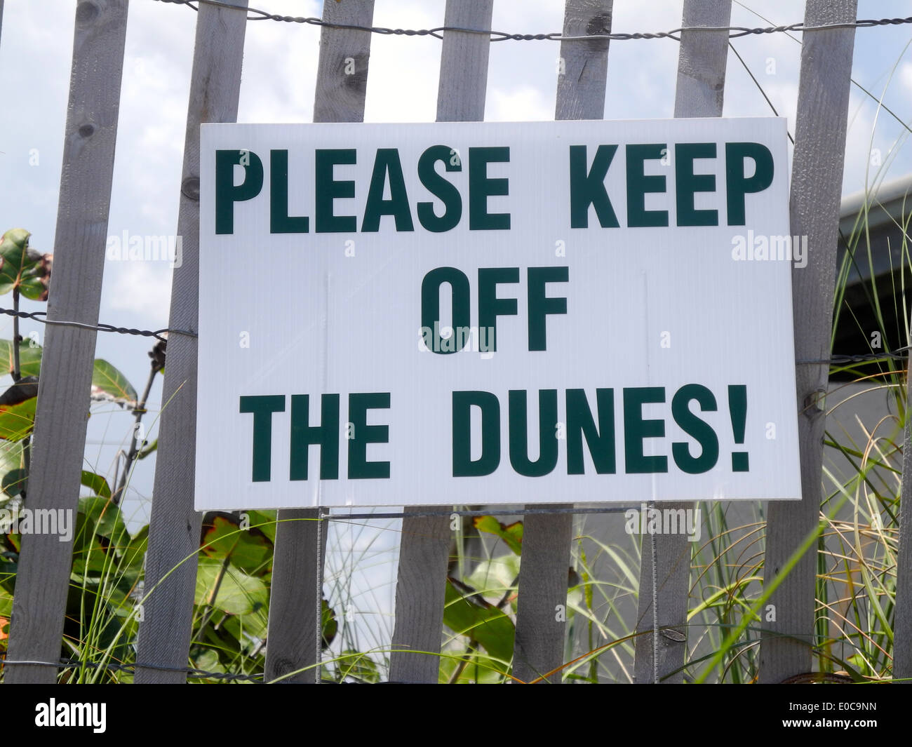 A Warning Sign The sign issues a warning to keep off the dunes and ...