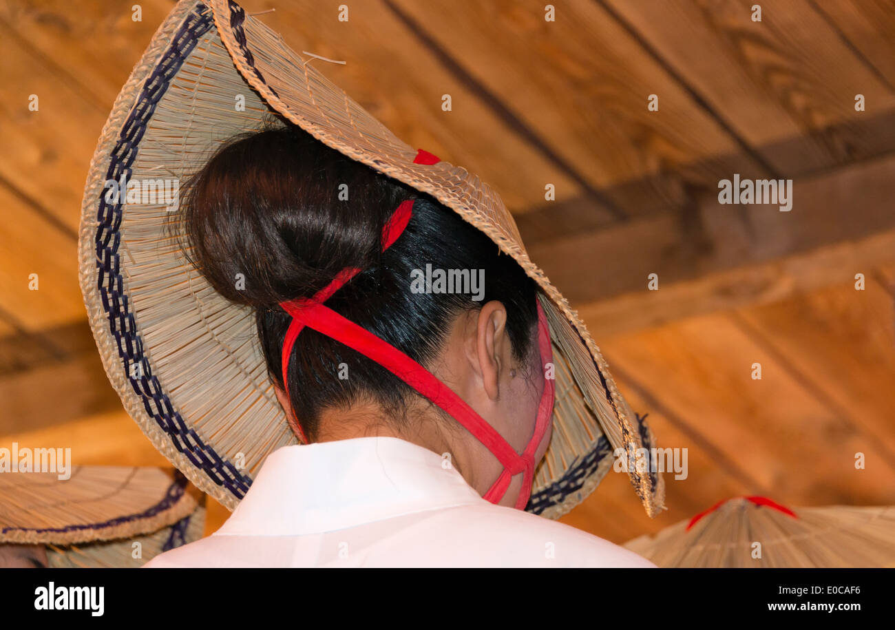 Ama woman in traditional clothing and hat dancing celebrating Shirahama ...
