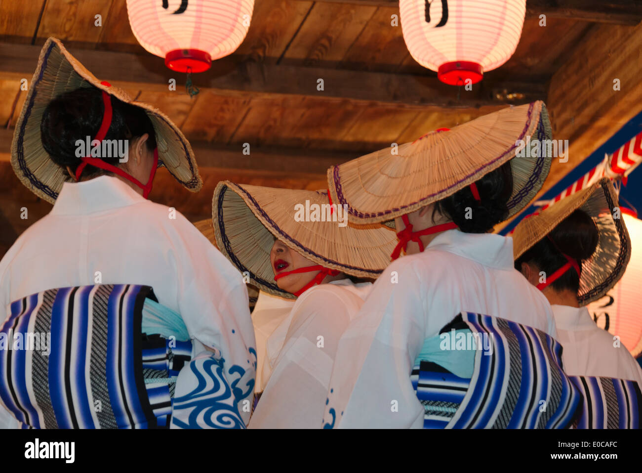 Ama woman in traditional clothing and hat dancing celebrating Shirahama ...