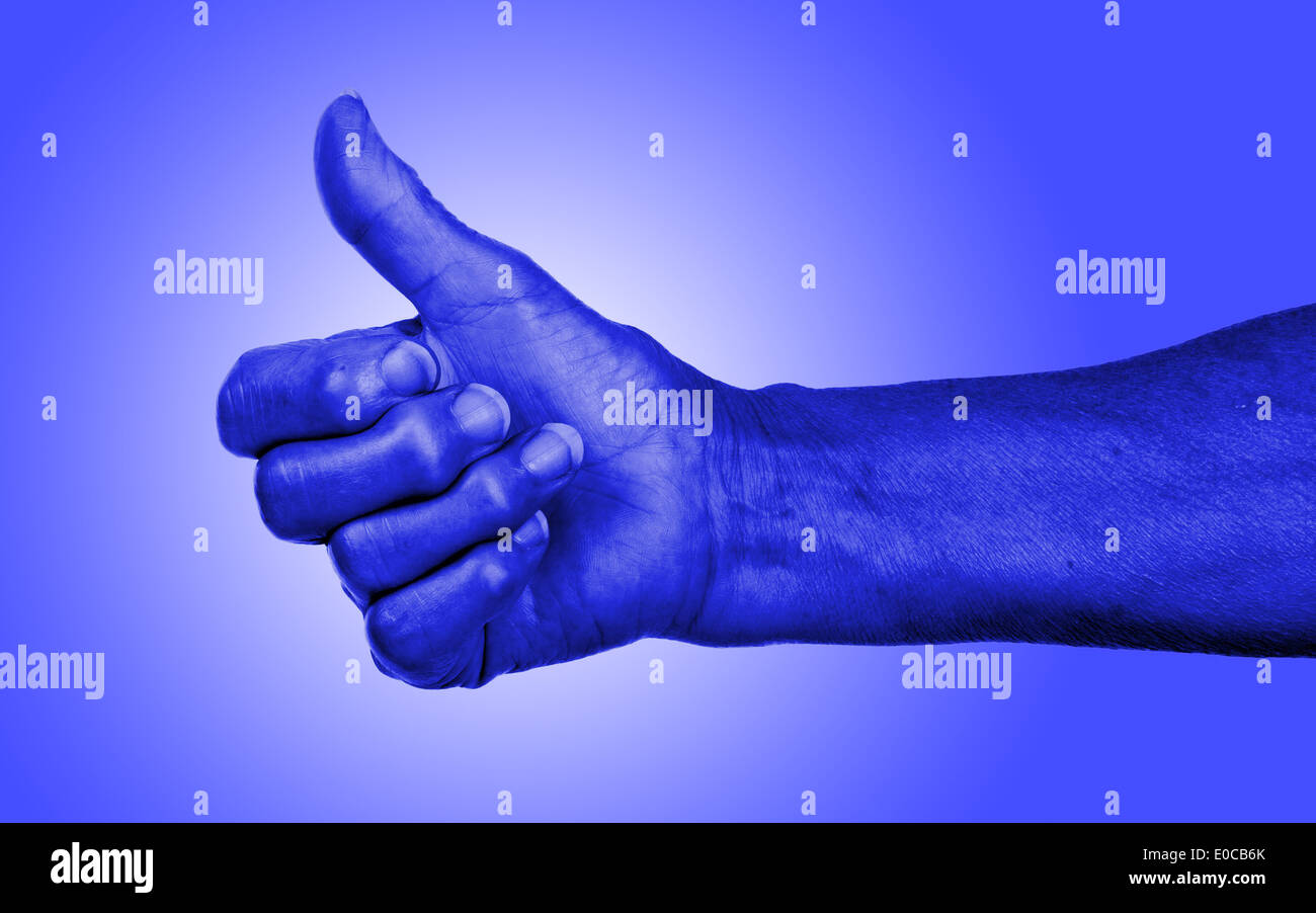 Old woman with arthritis giving the thumbs up sign blue skin Stock ...