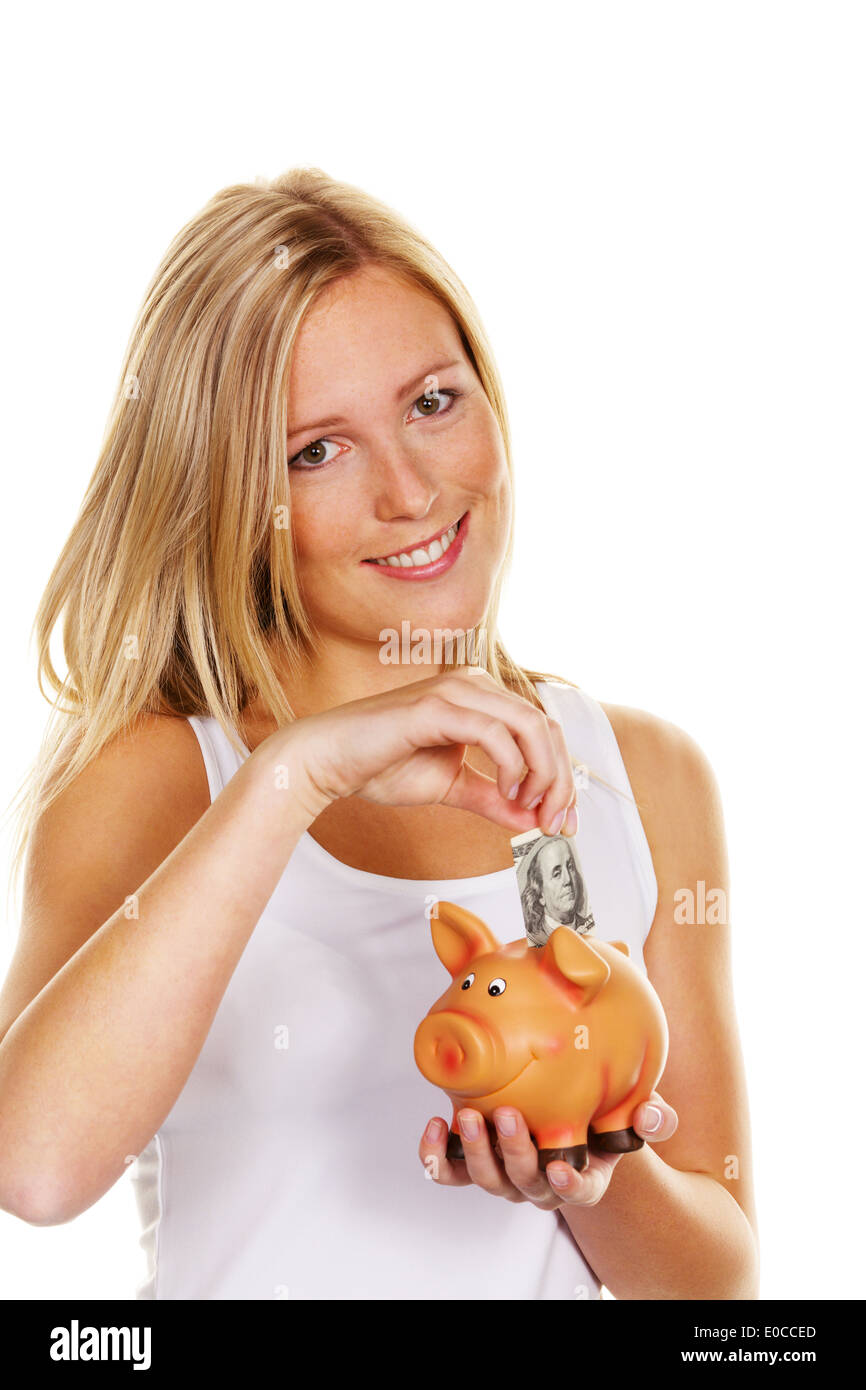 A young woman saves money and coins for the future. Precaution and save ...