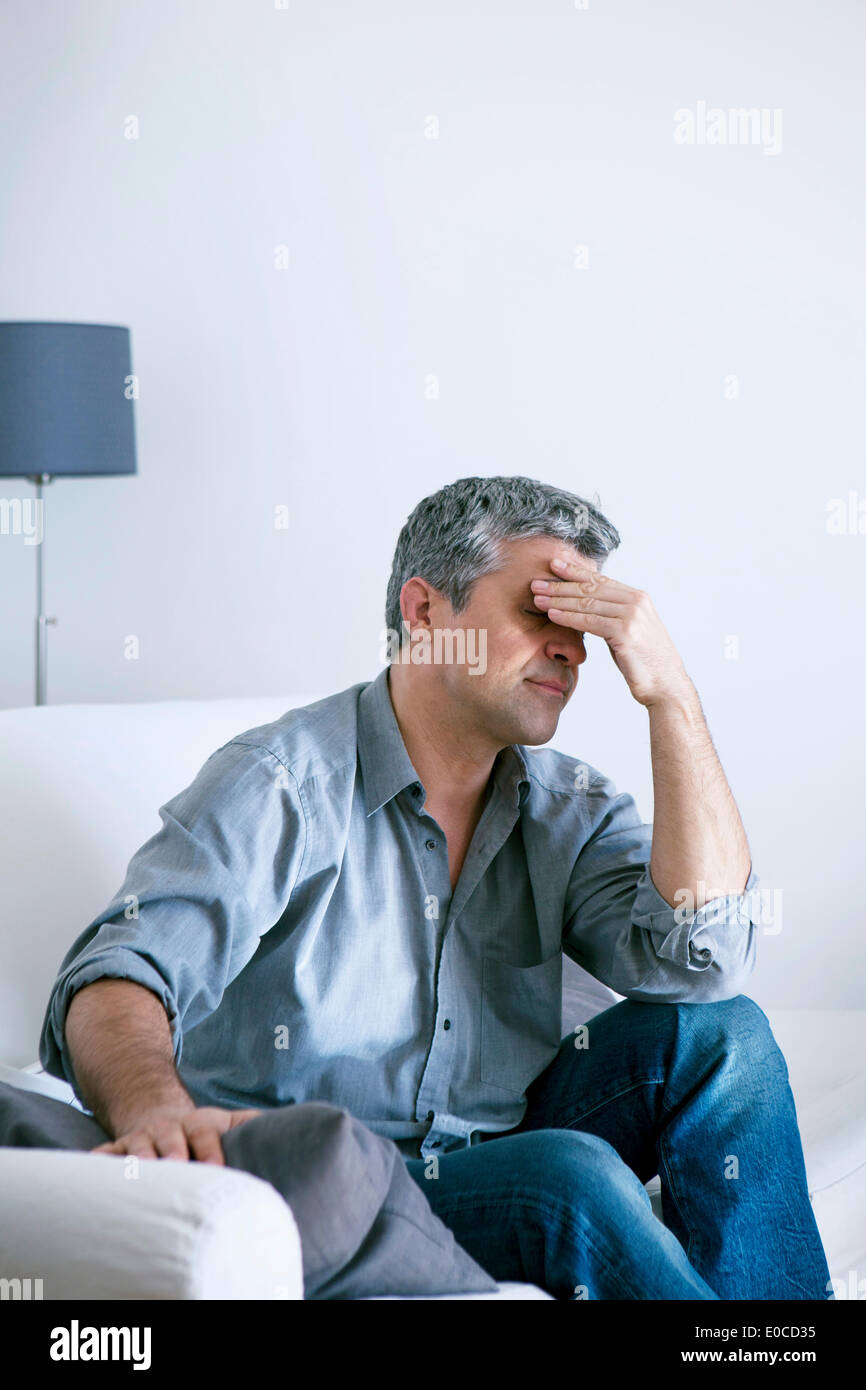 Man headache suffering hi-res stock photography and images - Alamy