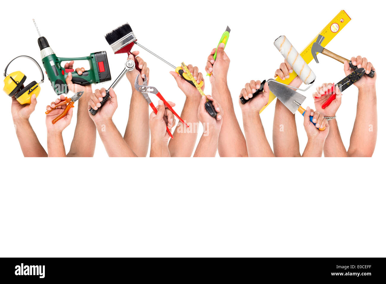 Several hands construction tools hi-res stock photography and images ...