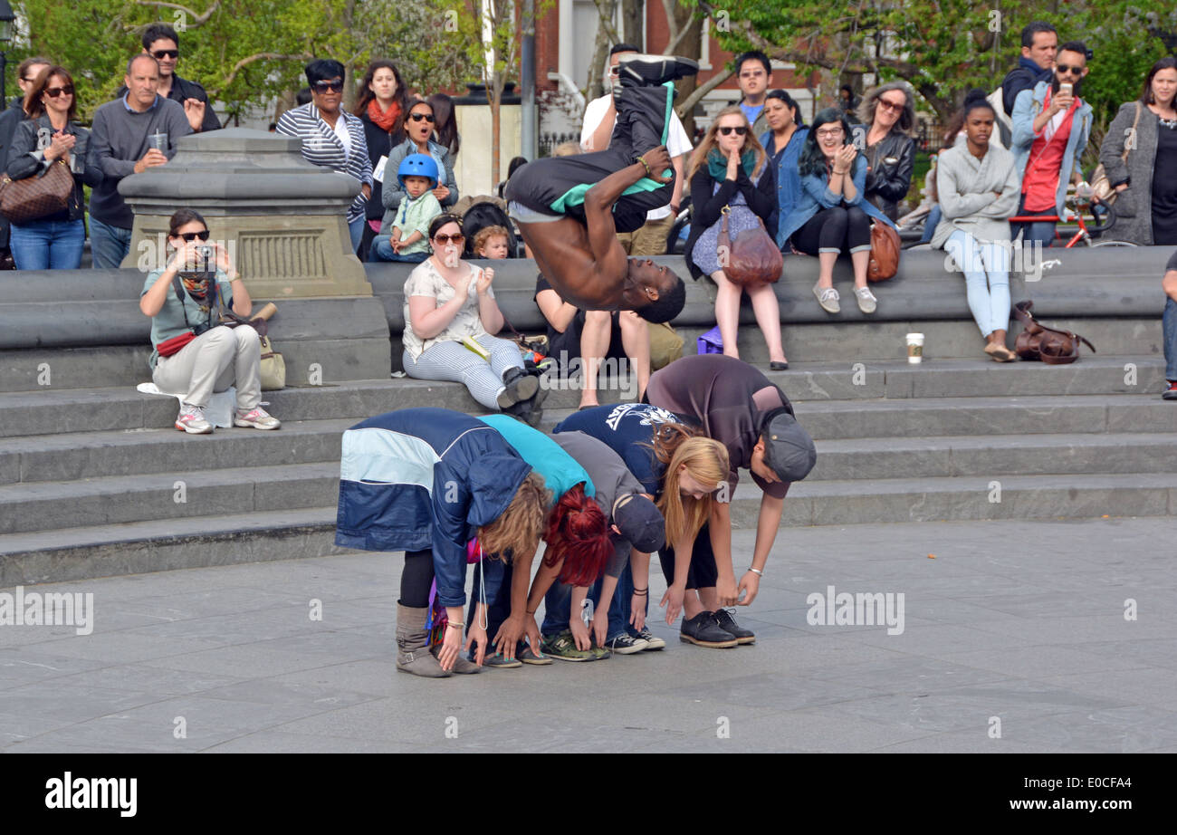 An acrobat dancer, stunt performer in Washington Square Park in ...