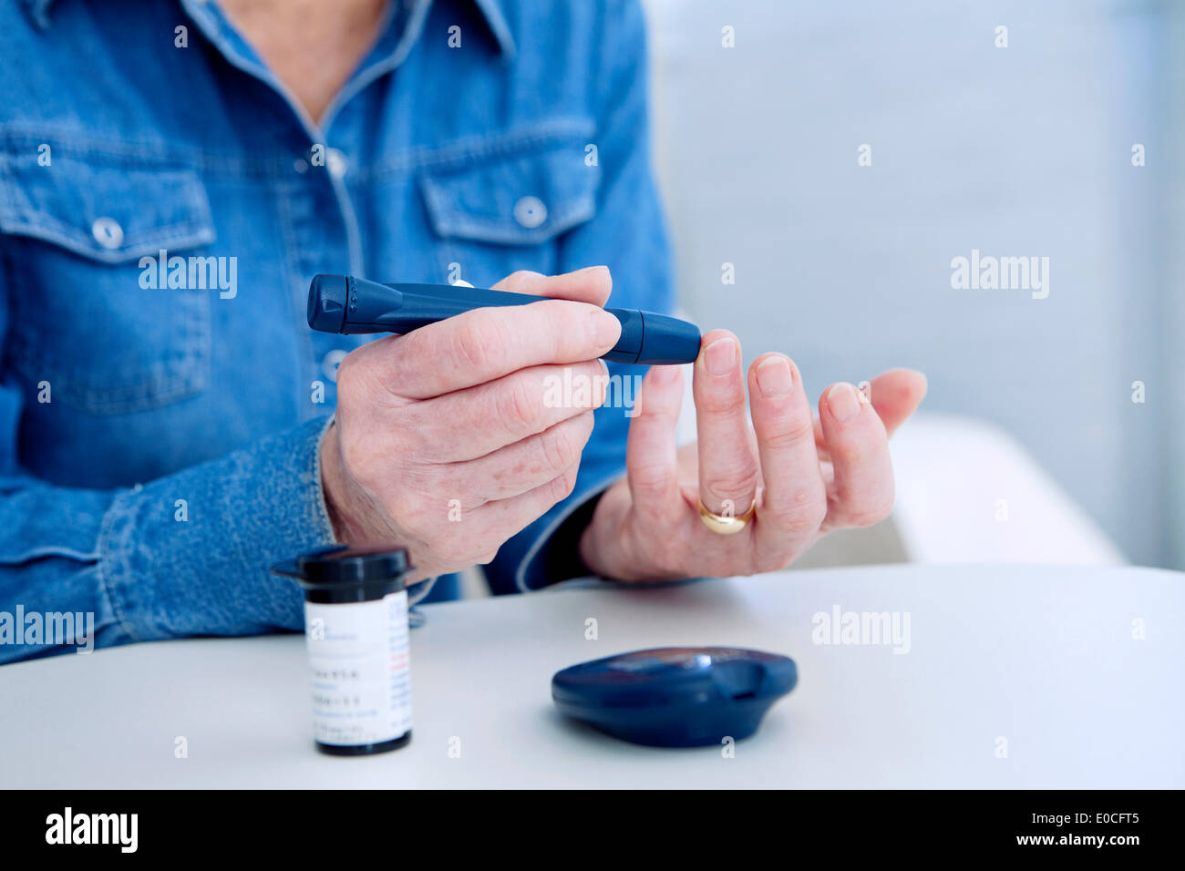 Elderly blood glucose test hi-res stock photography and images - Alamy